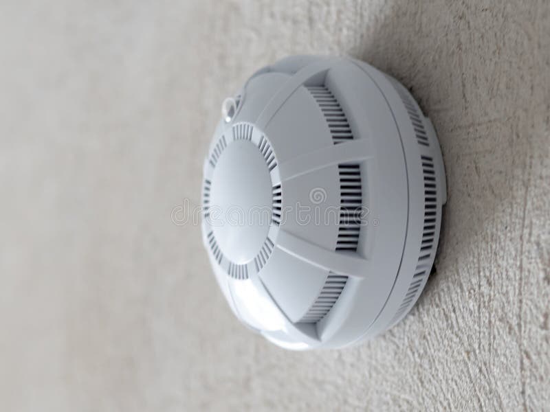 Smoke Detector Fire Alarm on the Grey Wall. Stock Image - Image of heat ...