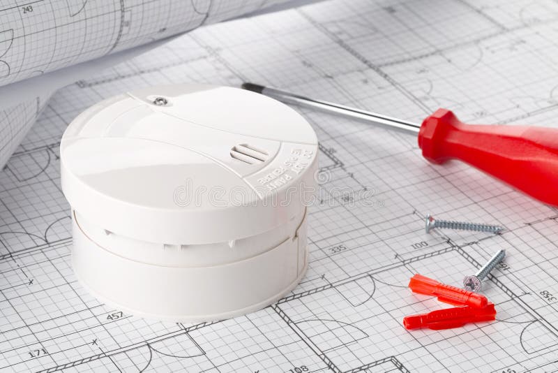 Smoke Detector or Fire Alarm Sensor on White Architectural Plans ...