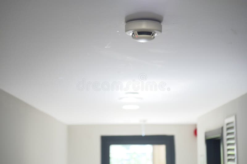 Smoke Detector Installed in a Modern Hallway for Safety Measures Stock ...
