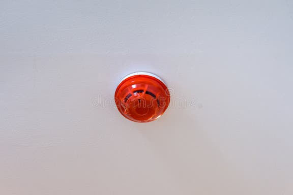 Smoke Detector with Plastic Cap Cover Mounted on Ceiling of the ...