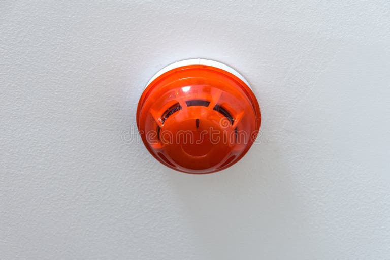 Smoke Detector with Plastic Cap Cover Mounted on Ceiling of the ...