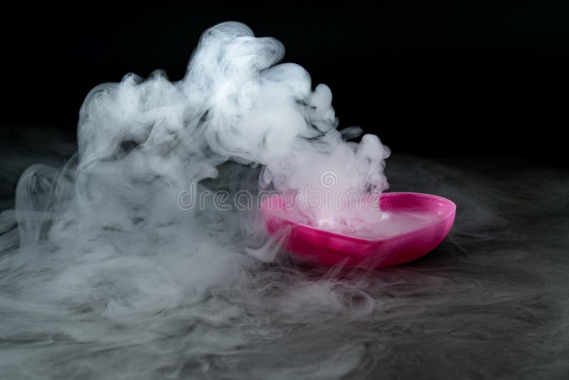 Smoke of Dry Ice with Pink Heart Shaped Cup Isolated on Black ...