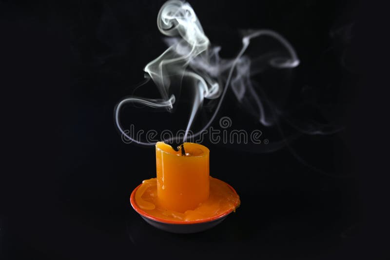 Smoke from an Extinguished Candle on a Dark Stock Image - Image of ...