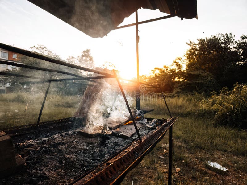 Smoke Fire Burning the Wood on the Sunset. Stock Image - Image of ...