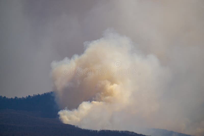 Smoke from a Fire in the Mountains Stock Photo - Image of people ...