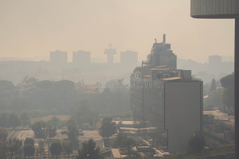 Smoke from a Fire Over a City in Rome, Italy Stock Photo - Image of ...
