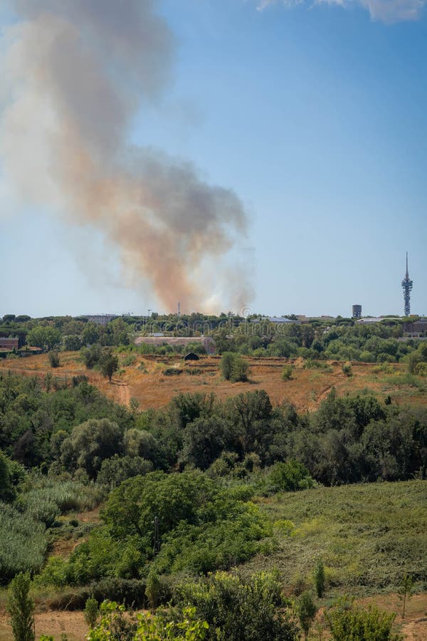 Smoke from a Fire Over a City on Sky in Rome, Italy Stock Image - Image ...