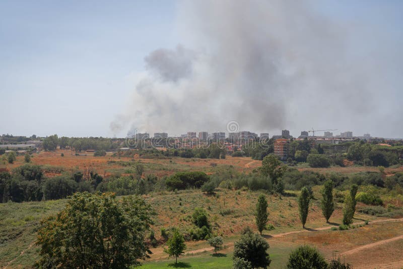 Smoke from a Fire Over a City on Sky in Rome, Italy Stock Photo - Image ...