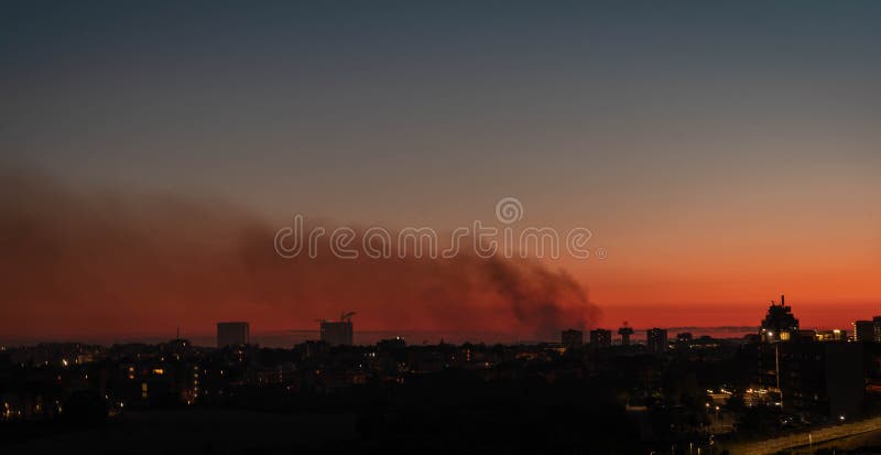 Smoke from a Fire Over a Night City on a Sunset Sky in Rome, Italy ...