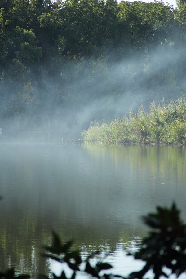 The Smoke from the Fire Spreading Over the River Stock Image - Image of ...