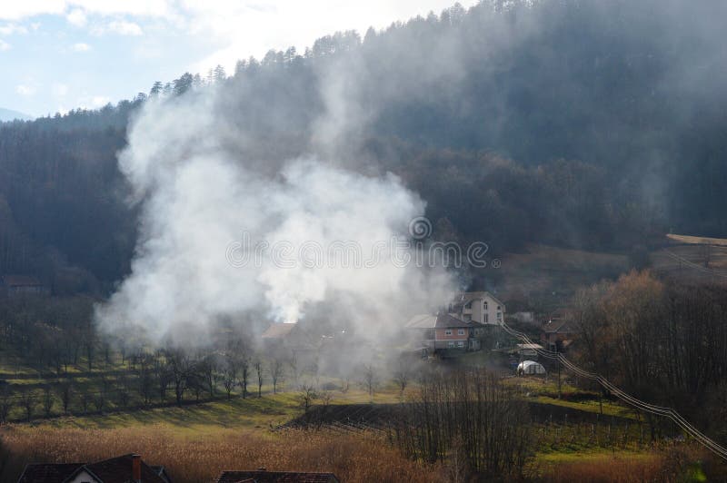 Smoke from the Fire in the Village Stock Image - Image of hill, tree ...