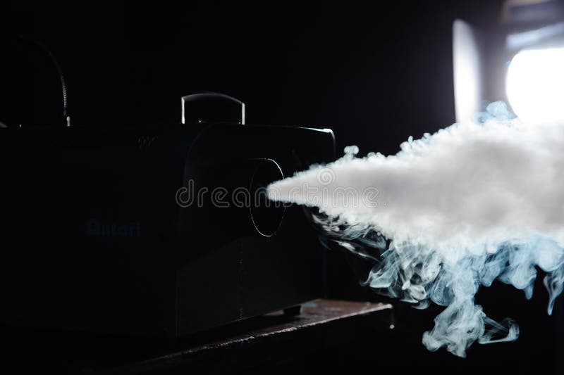 Smoke Machine in Action. Smoke in the Dark. Stock Image - Image of ...