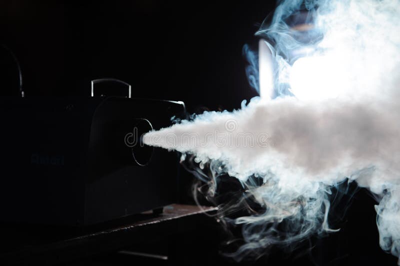 Smoke Machine in Action. Smoke in the Dark. Stock Image - Image of ...