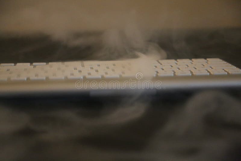 Smoke Over White Computer Keybord Stock Image - Image of burning ...