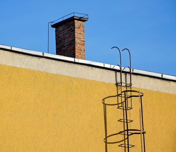 Smoke stack and ladder stock photo. Image of yellow, blue - 59496836