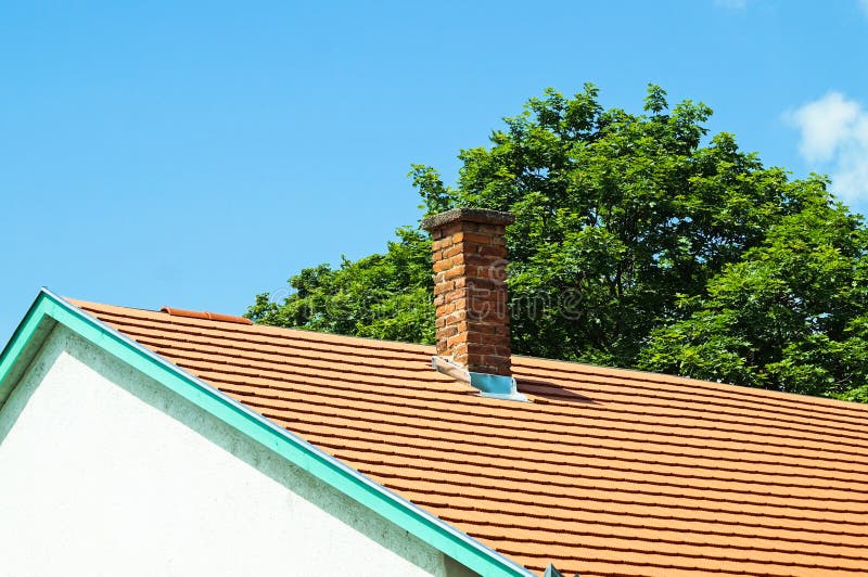 Smoke stack on the roof stock photo. Image of tile, tree - 61790254