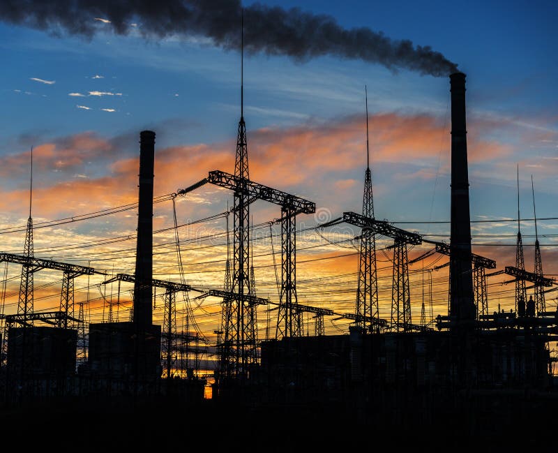 Smoke Stacks At Coal Burning Power Plant, Industrial Silhouette. Stock ... Smoke Stacks At Coal Burning Power Plant, Industrial Silhouette. Stock ...