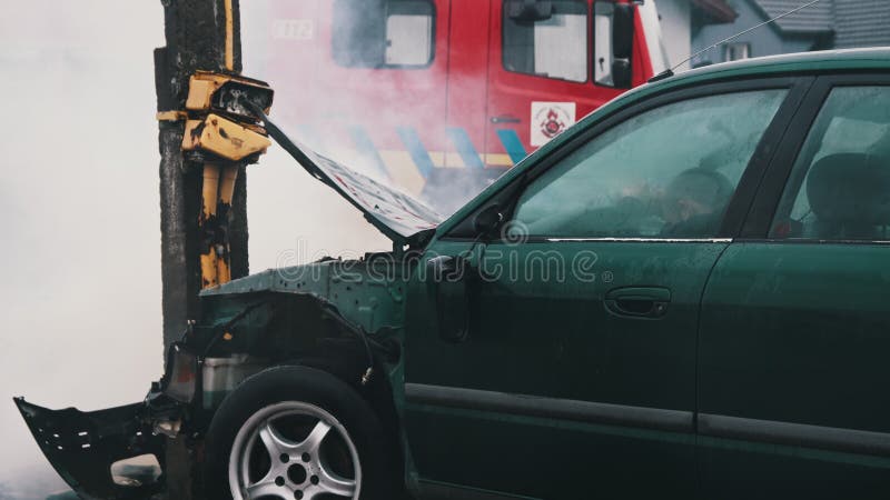 Smoke from Wrecked Car with Fire Engine in the Background. Car Accident ...