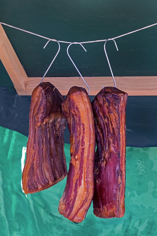 Smoked Bacon Hanging on a String Stock Photo - Image of bacon, cured ...