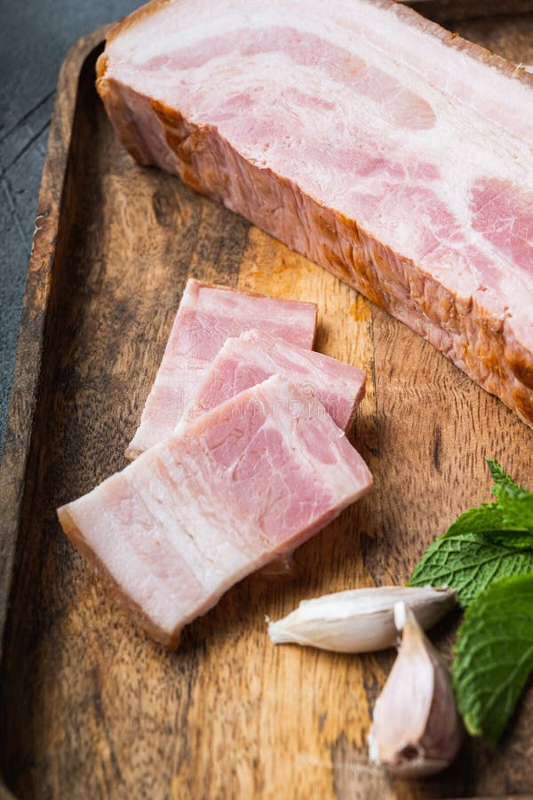 Smoked Bacon, Whole Slab on Grey Textured Background Stock Photo ...