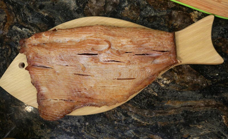 Smoked Carp Fillet on Cutting Board Stock Image - Image of fish, smoked ...
