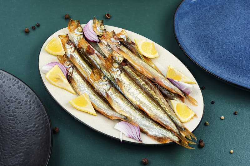 Smoked dry capelin stock image. Image of people, smoked - 329732479