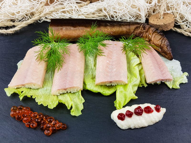 Smoked eel fillet stock photo. Image of gourmet, golden - 206496208