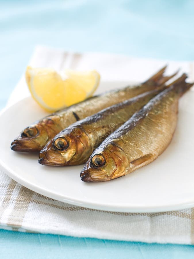 Smoked fish on a plate stock image. Image of delicacy - 11948775