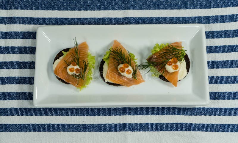 Smoked fish canapes stock photo. Image of pepper, canape - 202052412