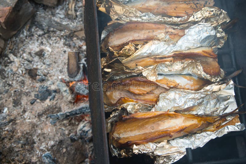 Smoked fish on fire stock image. Image of seafood, cooking - 55435579