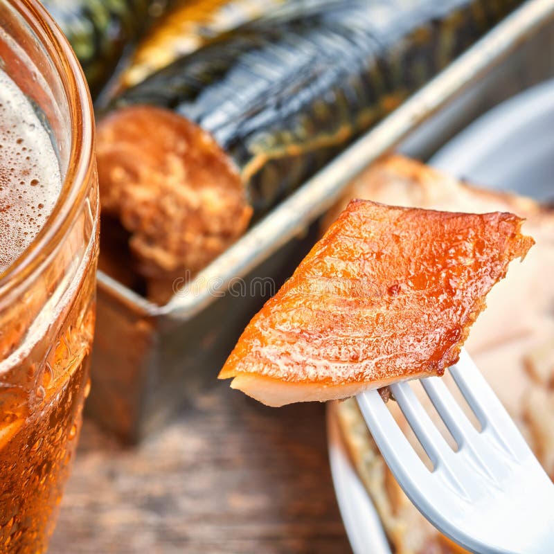 Smoked fish on a fork stock photo. Image of dish, fork - 80762412