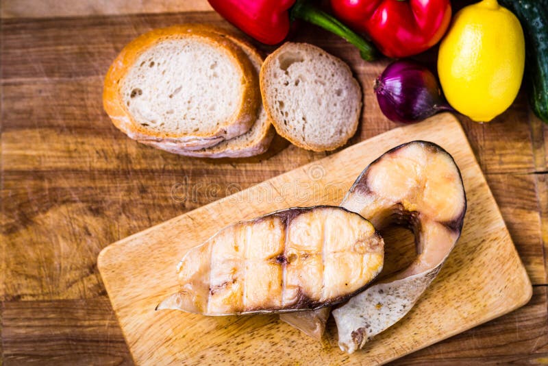 Smoked fish with garnish stock image. Image of mackerel - 47669675