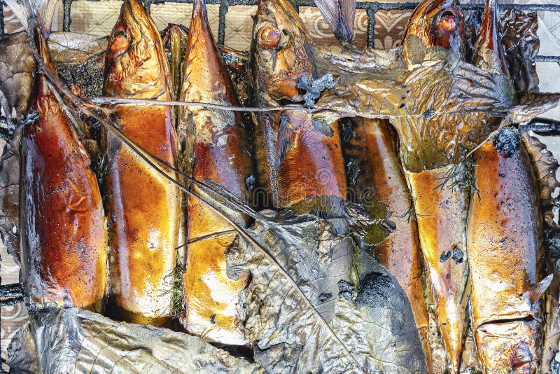 Smoked Fish Mackerel Whole with His Head on the Grid. Hot Smoked Fish ...
