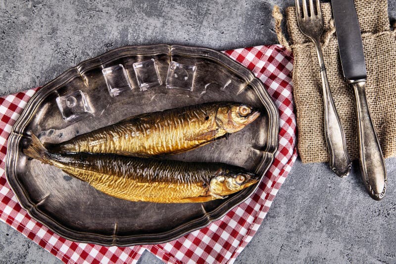 Smoked Fish in a Traditional Way on a Rustic Background Stock Photo ...