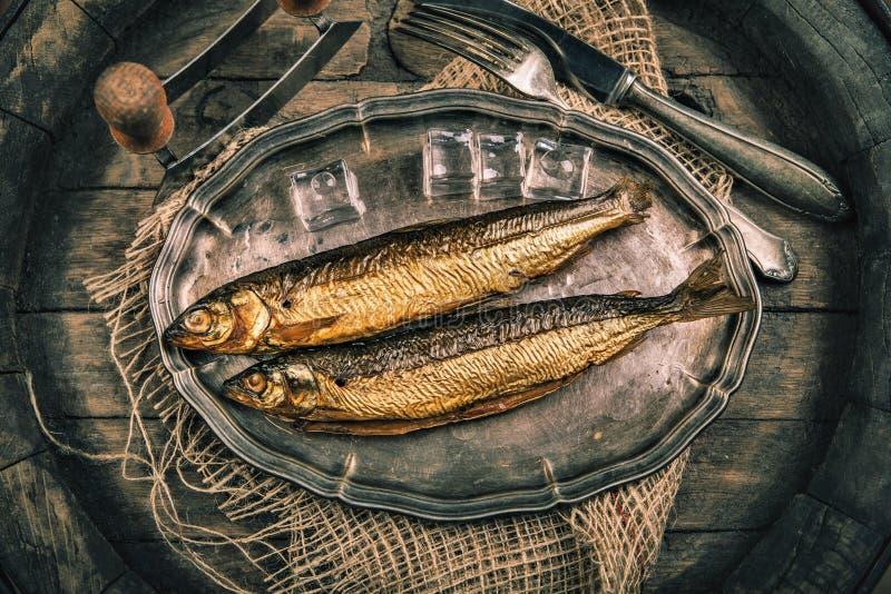 Smoked Fish in a Traditional Way on a Rustic Background Stock Image ...