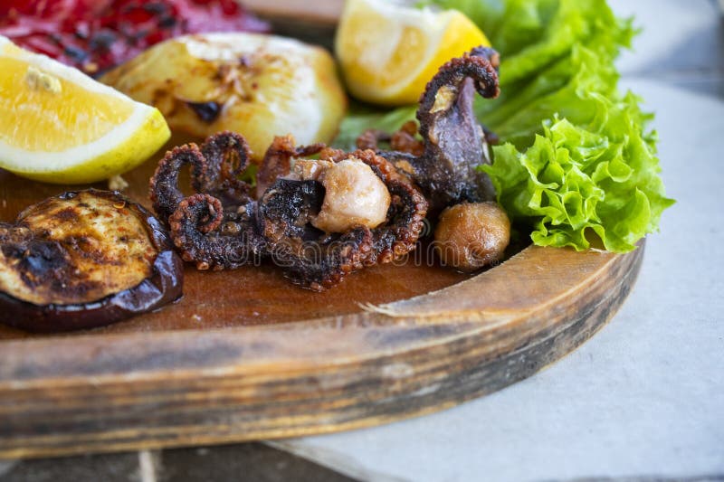 Smoked and fried octopus stock image. Image of nature - 342744489