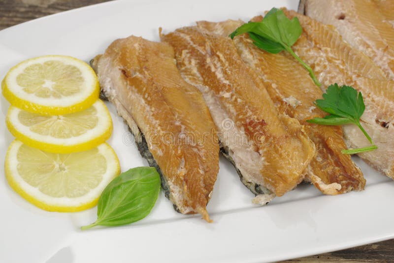 Smoked herring fillets stock image. Image of basil, diet - 108327601
