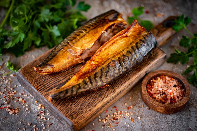 Smoked Mackerel on a Board. Smoked Fish for Lunch. Close-up Stock Photo ...