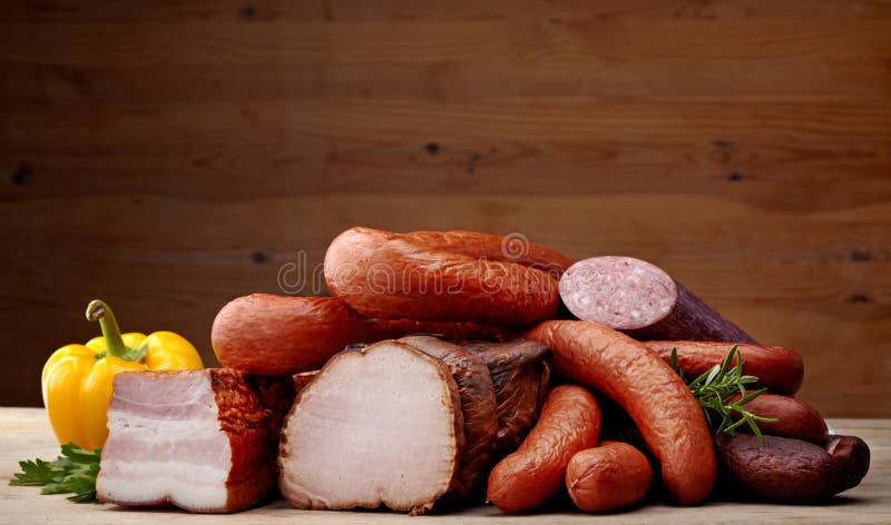 Smoked meat and sausages stock image. Image of dinner - 25998387