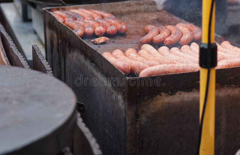 Smoked Meats on the Grill at Christmas Market Stock Photo - Image of ...