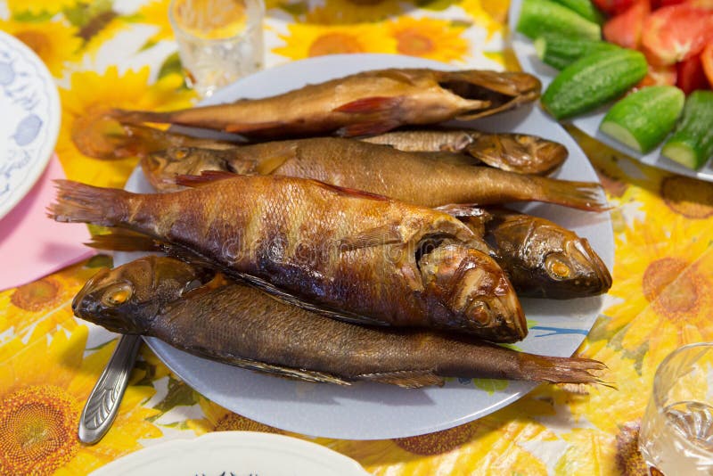 Smoked perch on a plate. stock photo. Image of appetizing - 132411098