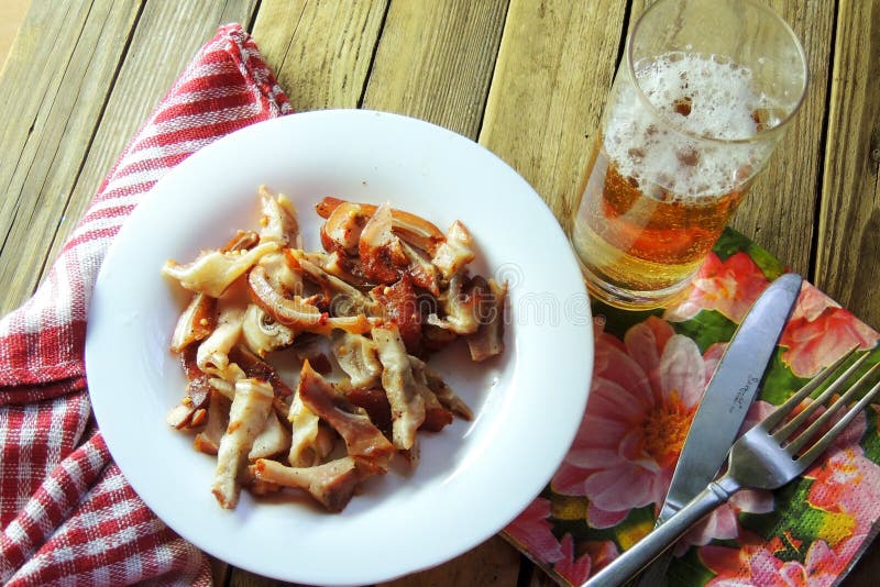 Smoked pig ears. Beer stock photo. Image of golden, dish - 92135434