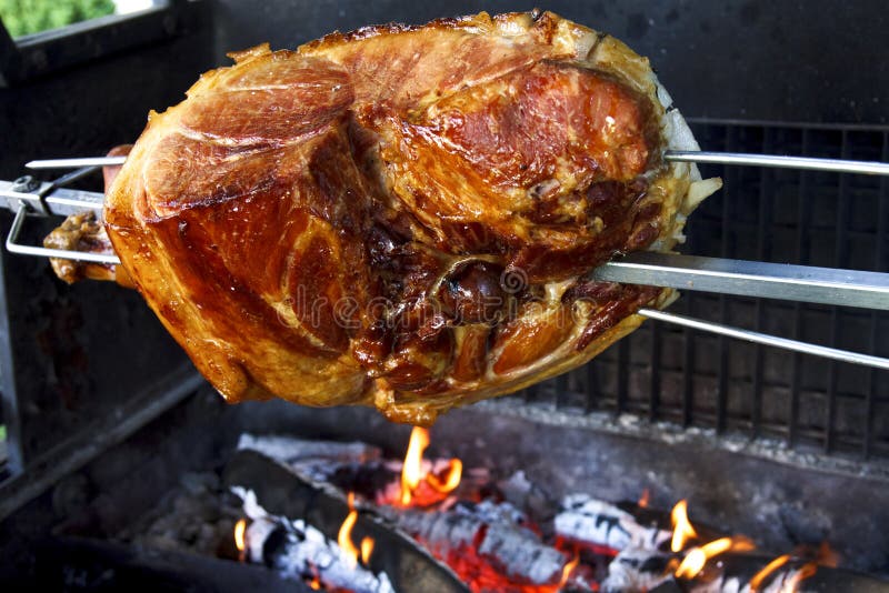 Smoked Pork Haunch on Spit Over Wood Fire. Stock Image - Image of ...