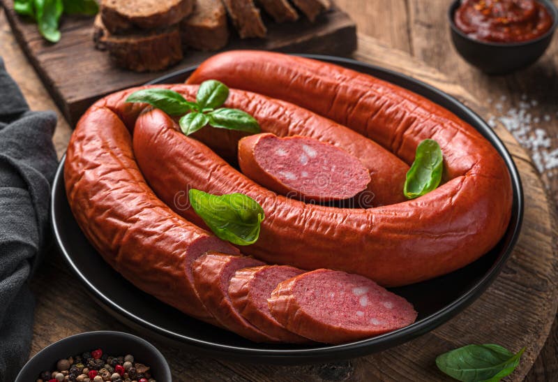 Smoked Sausage with Basil Close-up. Side View Stock Photo - Image of ...