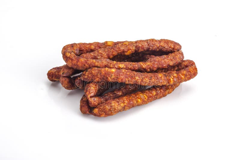 Smoked Sausage Cane on a White Background Stock Photo - Image of herbs ...
