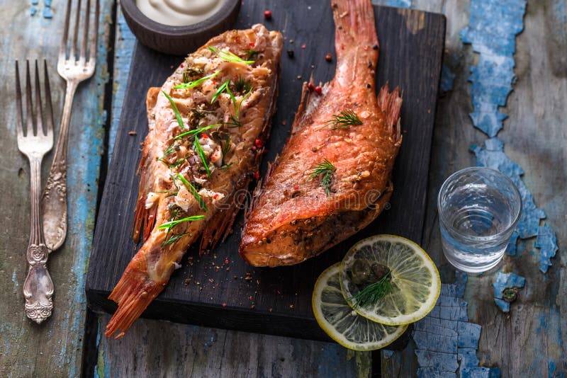 Smoked Sea Perch with Mayo and Lemon on Cutting Board, Top View Stock ...