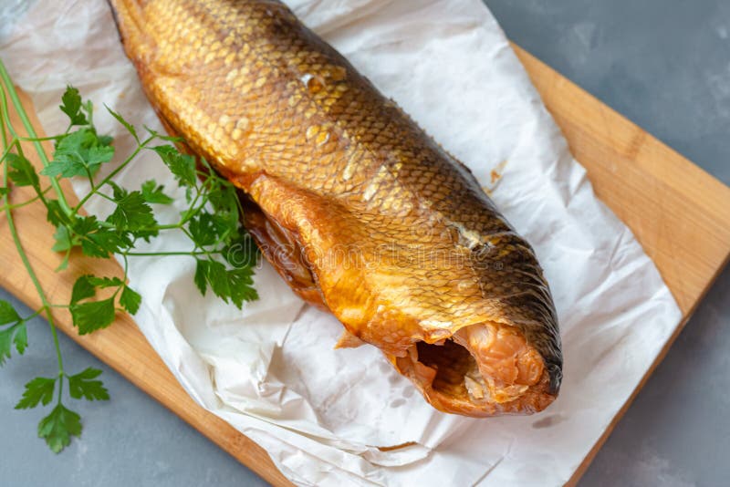 Smoked Whitefish on a Board Stock Photo - Image of cuisine, garnish ...
