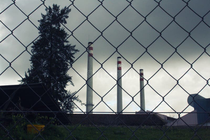 Smokestacks at the factory stock image. Image of technology - 86230829