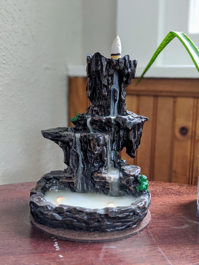 Smokey Incense Waterfall stock photo. Image of meditation - 217939516