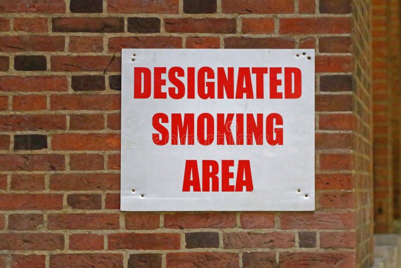 Smoking Area stock image. Image of smoking, bricks, sign - 129429381